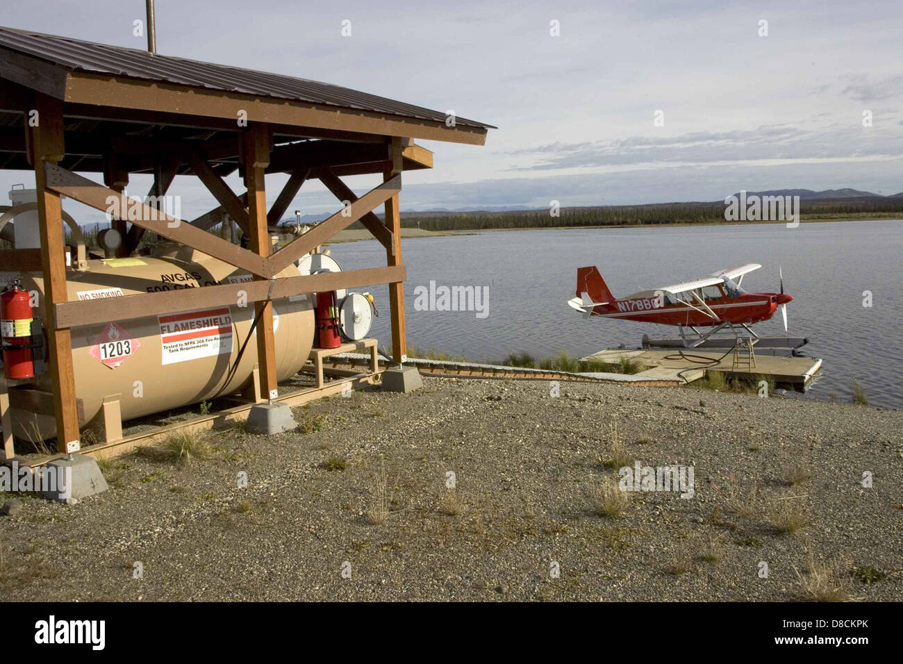 A facility designed for floatplanes, with planes resting on water or ...