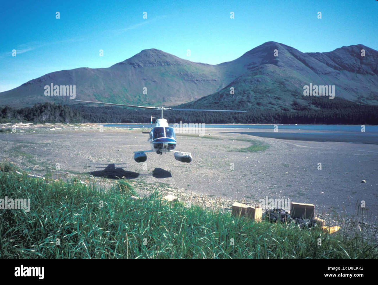 A helicopter hovering in mid-air, with the camera angle emphasizing its ...