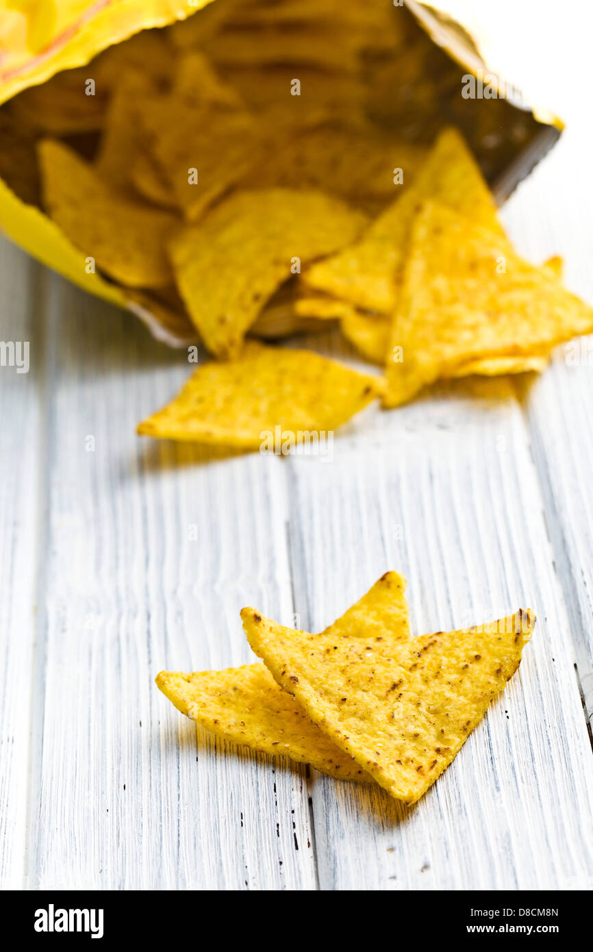 corn nachos on wooden table Stock Photo - Alamy