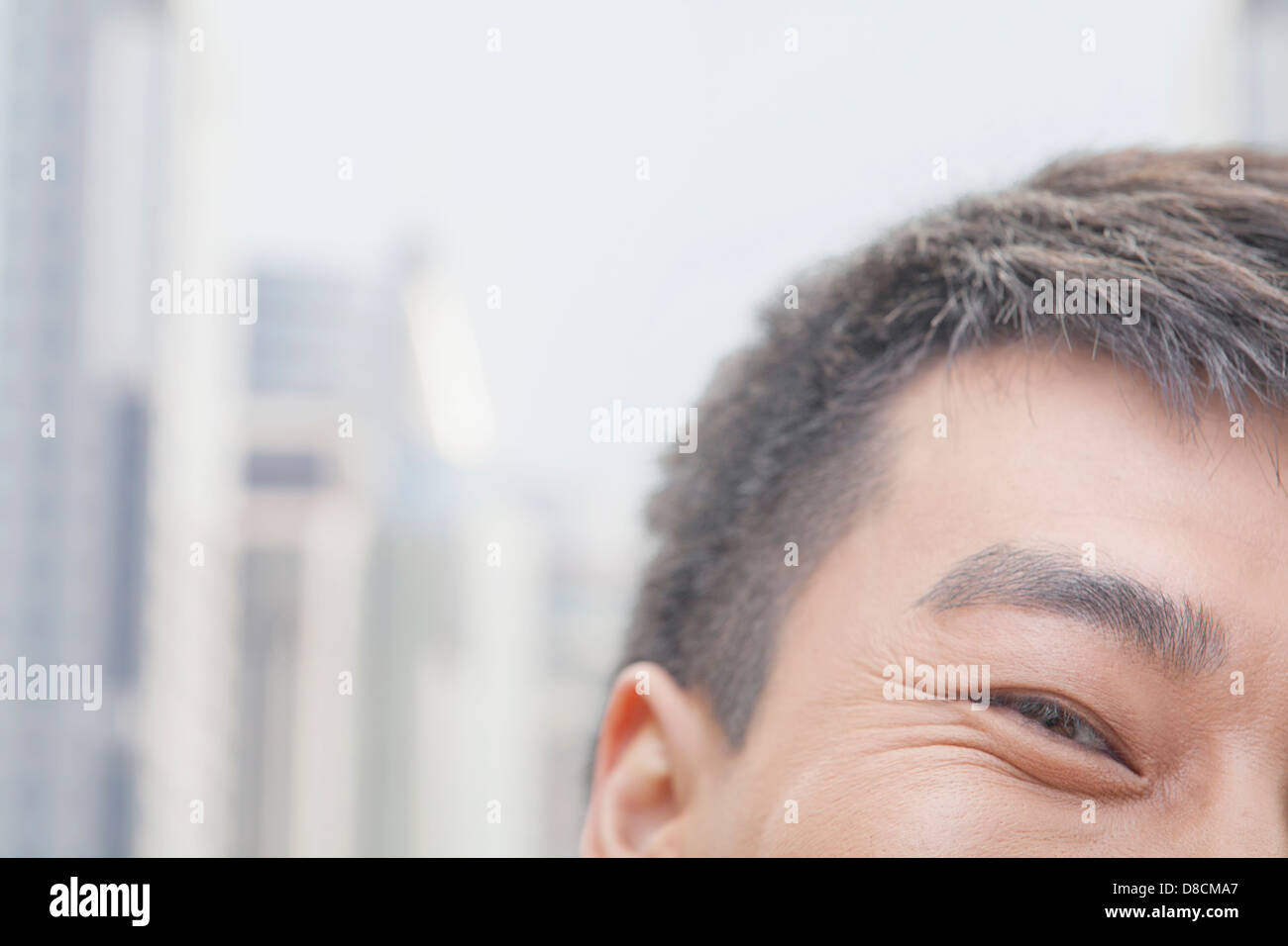 Close Up of Male Eye and Face Smiling in Beijing Stock Photo - Alamy