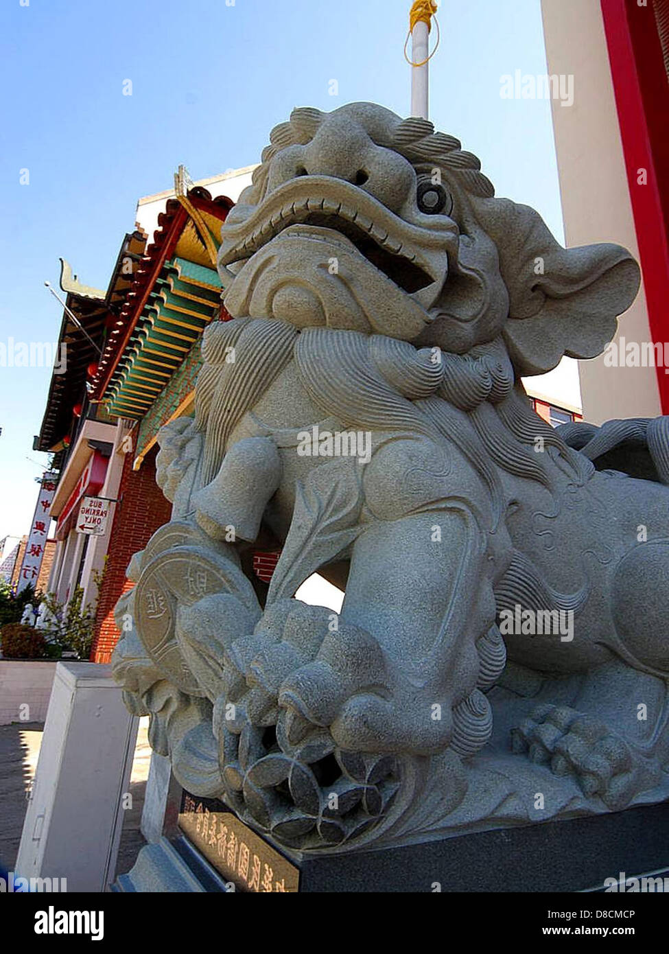 A Foo dog statue, commonly seen in Chinese architecture, stands in ...