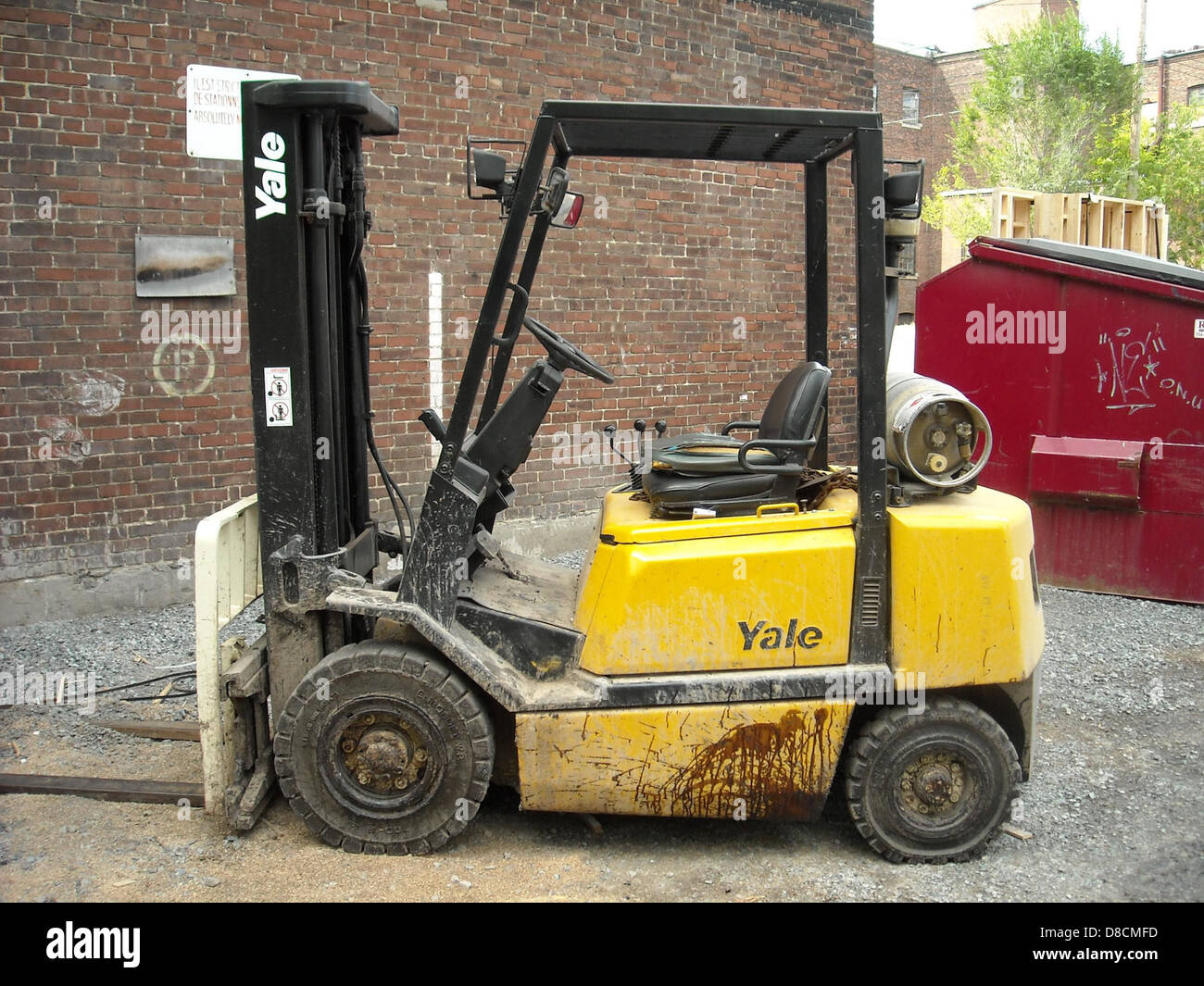 A forklift vehicle in use for lifting heavy loads. Commonly seen in ...