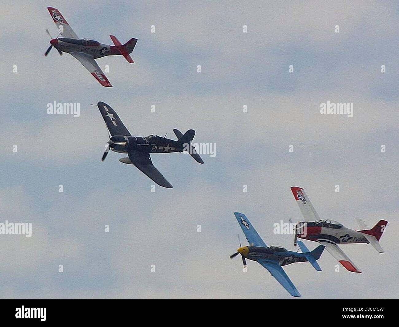 Four planes soar through the sky in a formation, demonstrating flight ...