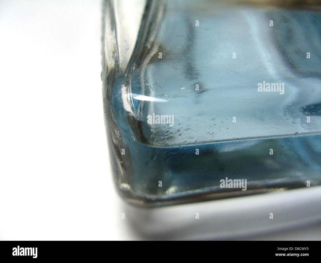 A detailed close-up of glass at a corner, showing the precision and ...
