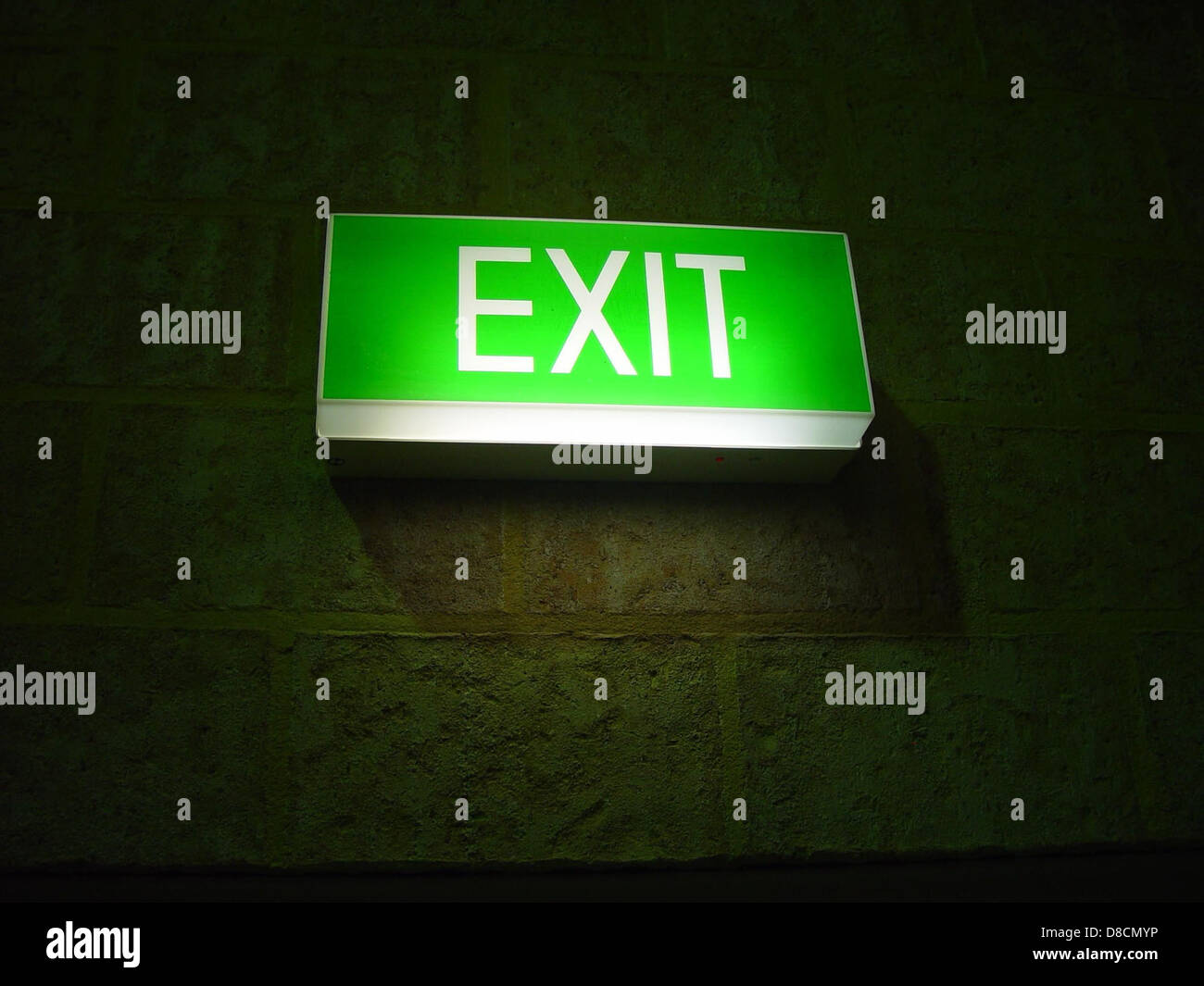 Glowing exit sign Stock Photo - Alamy
