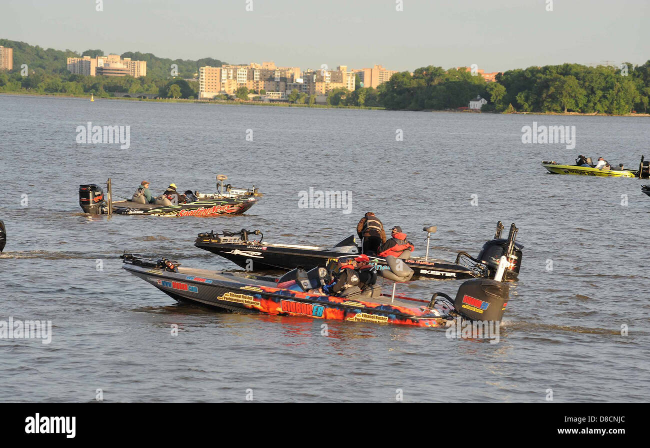 This image features groups of people on speedboats, likely engaged in ...