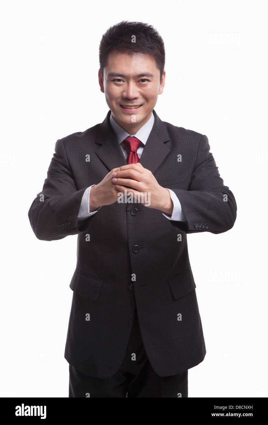 Businessman Bowing Toward Camera Stock Photo - Alamy