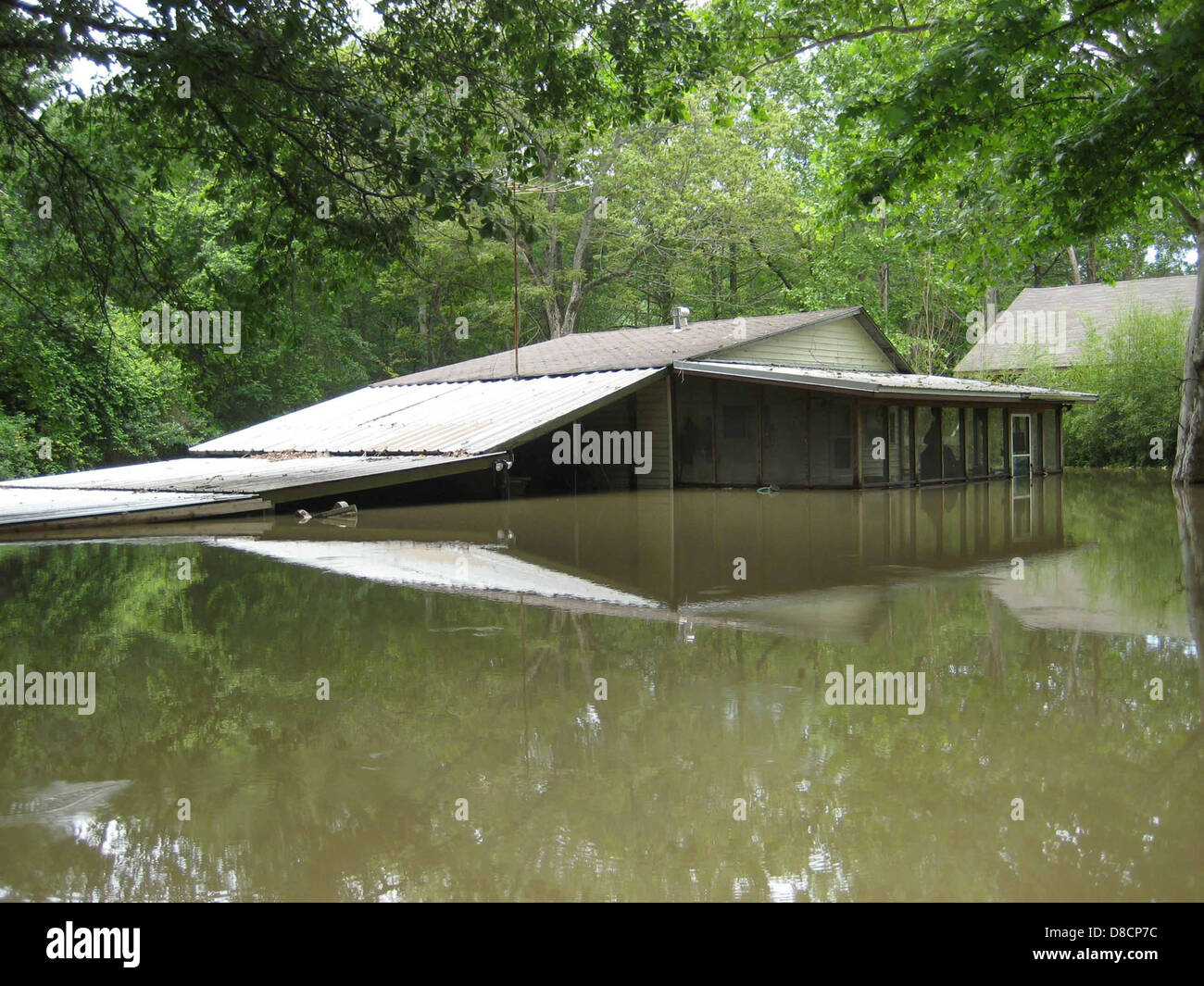 Flooded housing and facilities due to heavy rainfall or natural ...
