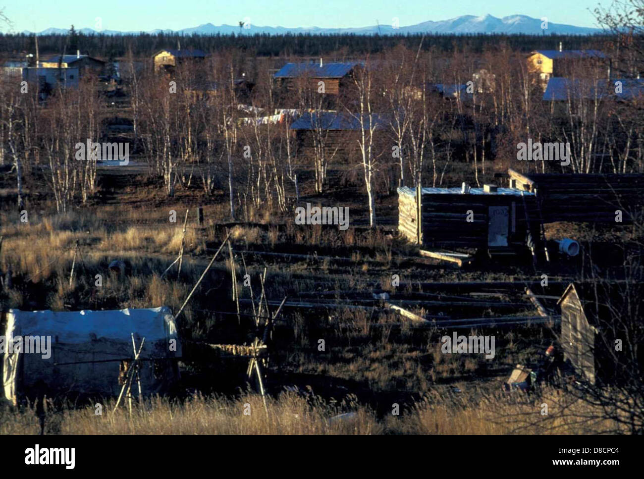 A peaceful view of Huslia village, located in Alaska. The village shows ...