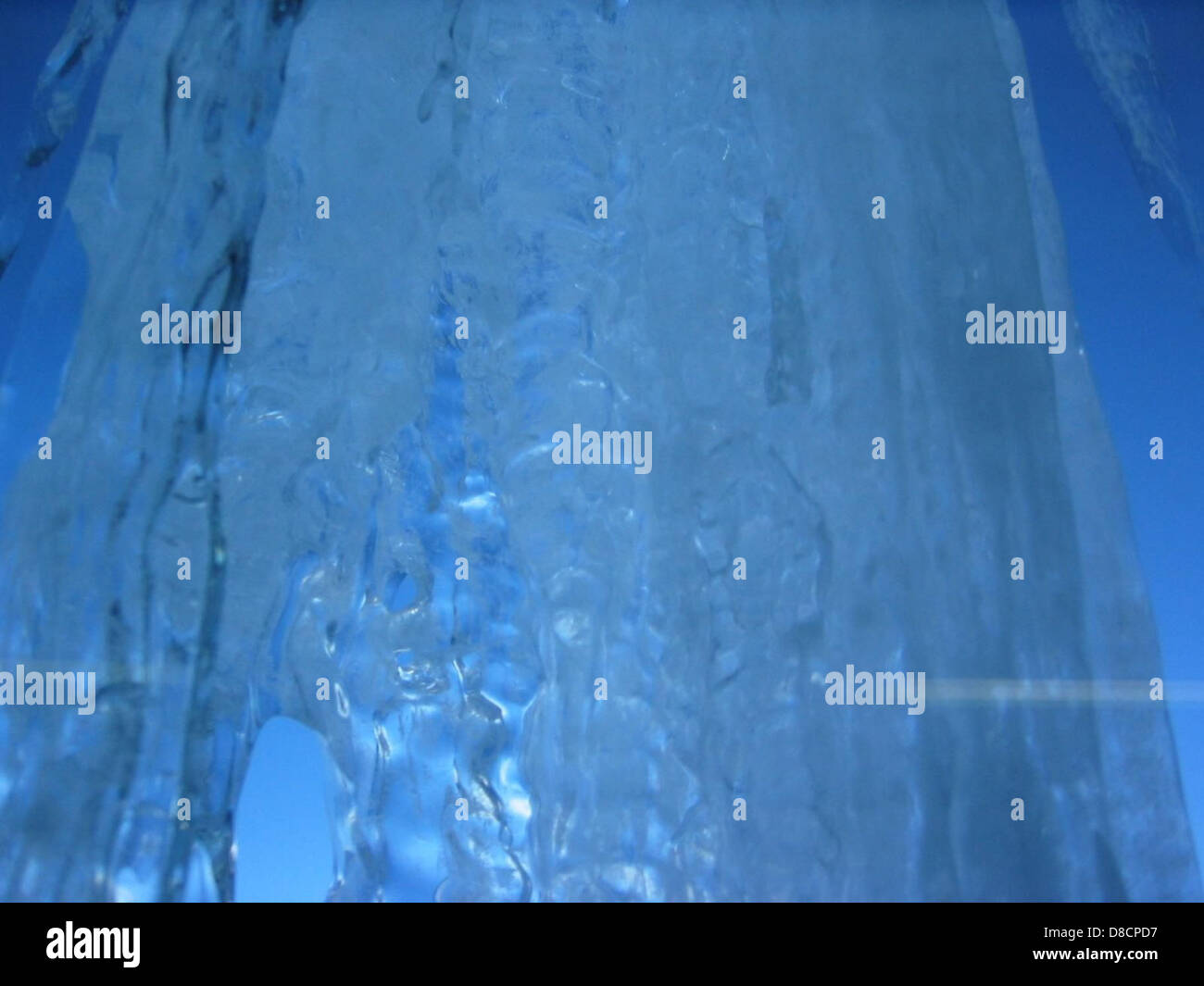 An icy background featuring frozen surfaces and crystalized ice ...