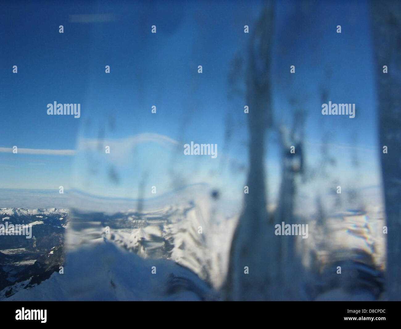 A close-up image of ice, showcasing its crystalline structure and ...