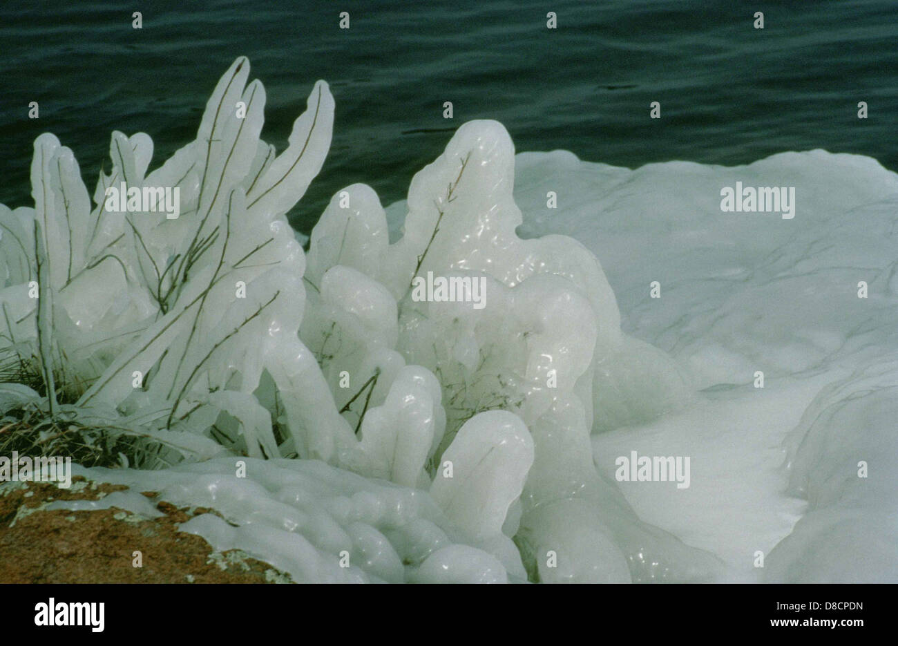 The image captures an icy landscape with various ice formations ...