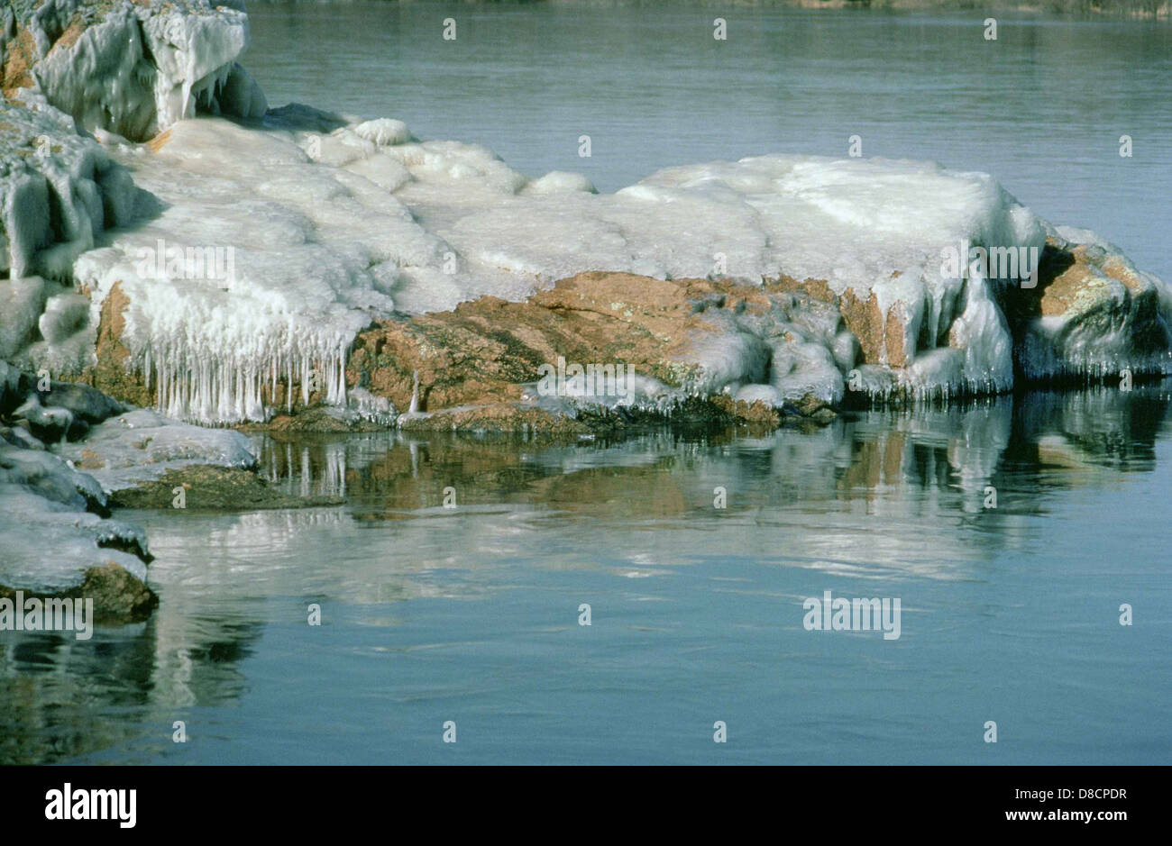 Ice formation on rocky on river coast Stock Photo - Alamy