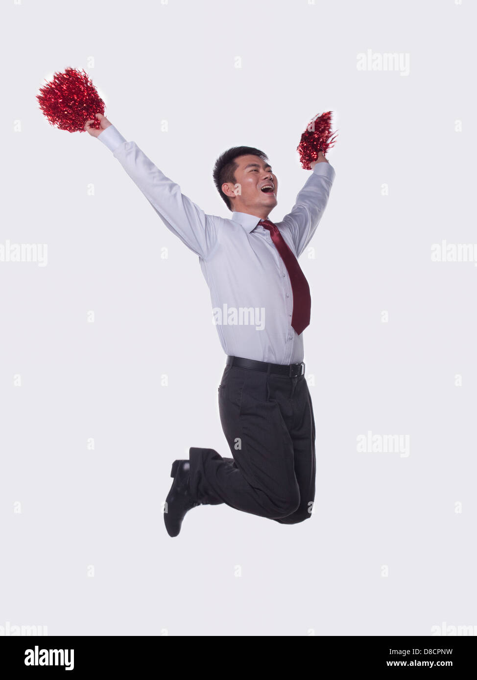 Businessman Jumping and Cheering Stock Photo - Alamy