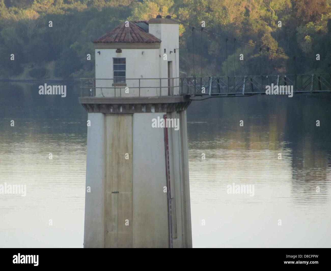 The intake structure for a pumping station is shown, where water is ...