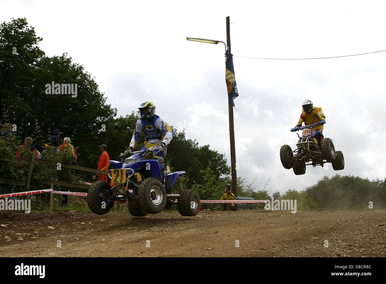 A buggy jumps in mid-air during a sport race, demonstrating the vehicle ...