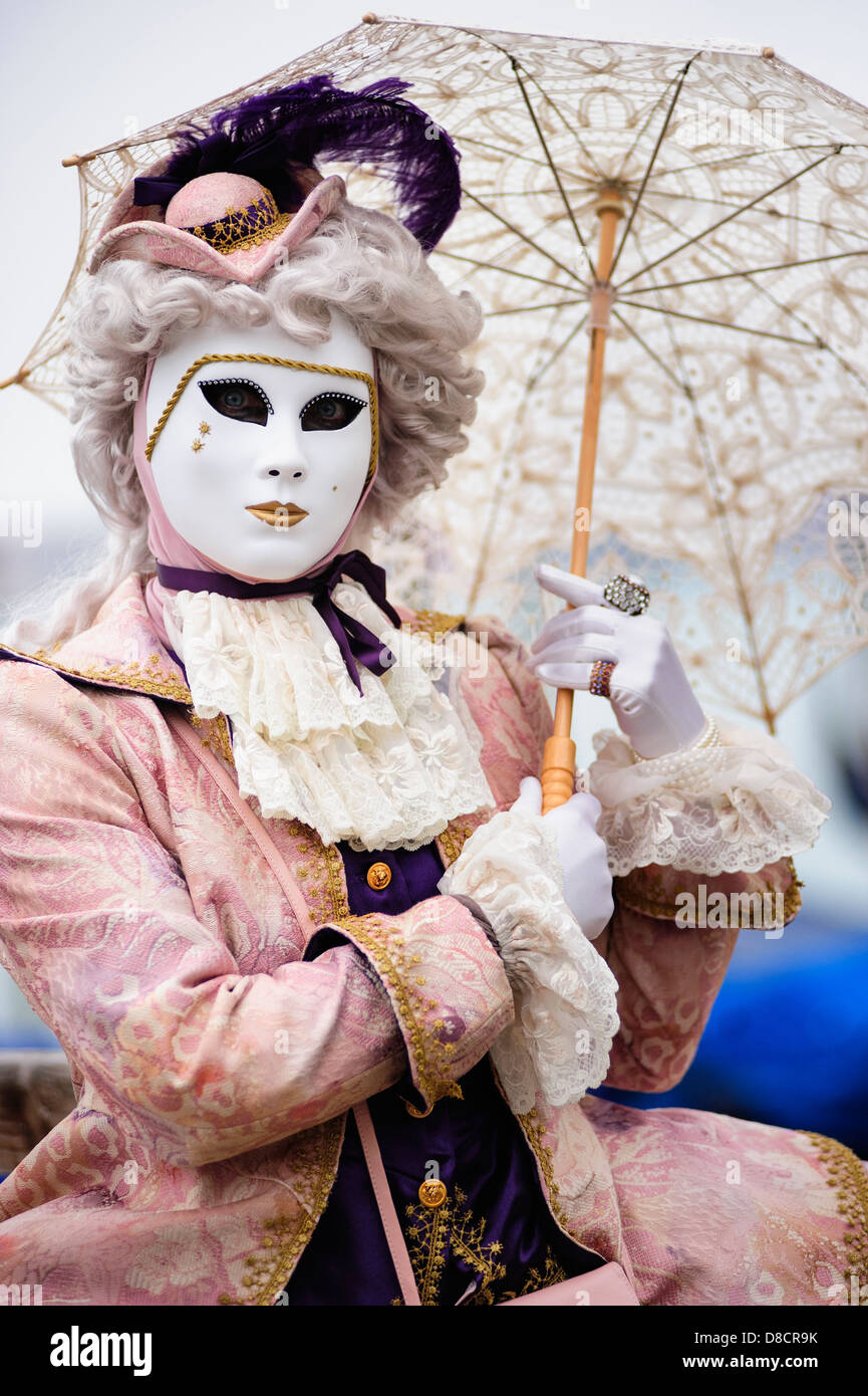 A woman posing with a very elegant carnival costume during the Venetian ...