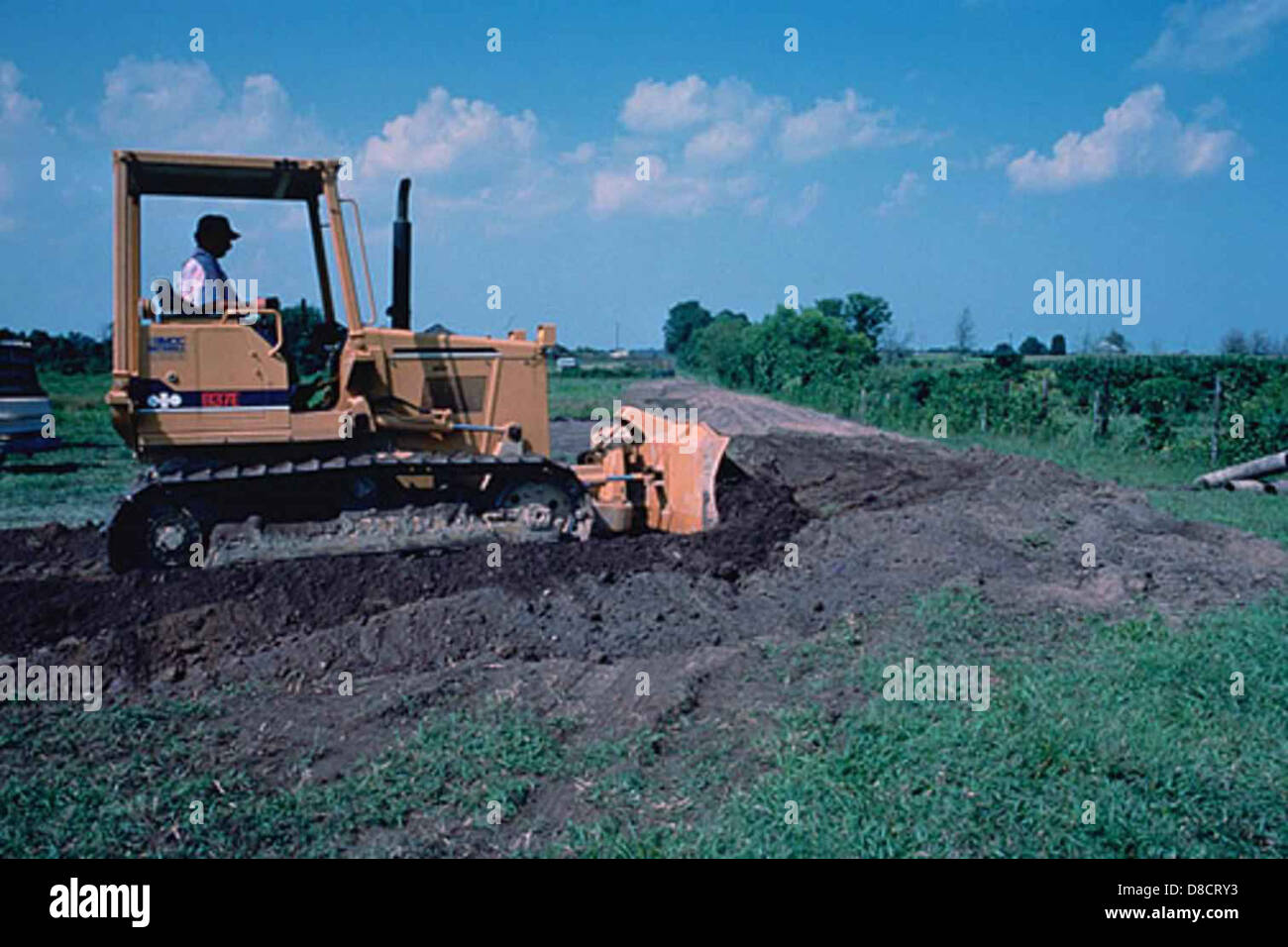 A bulldozer is seen leveling land, a process commonly used in ...