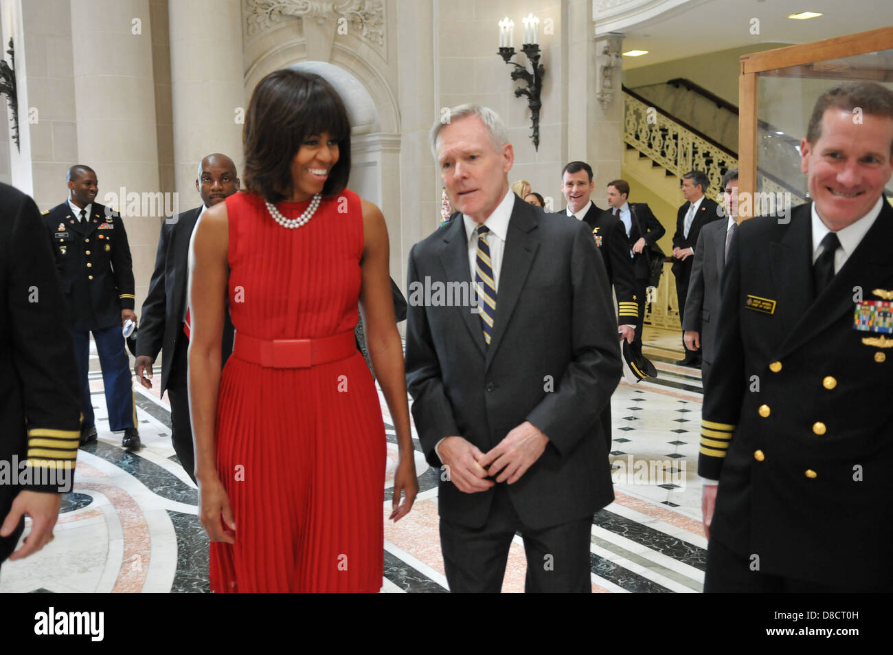 US First Lady Michelle Obama walks with Secretary of the Navy Ray Mabus ...