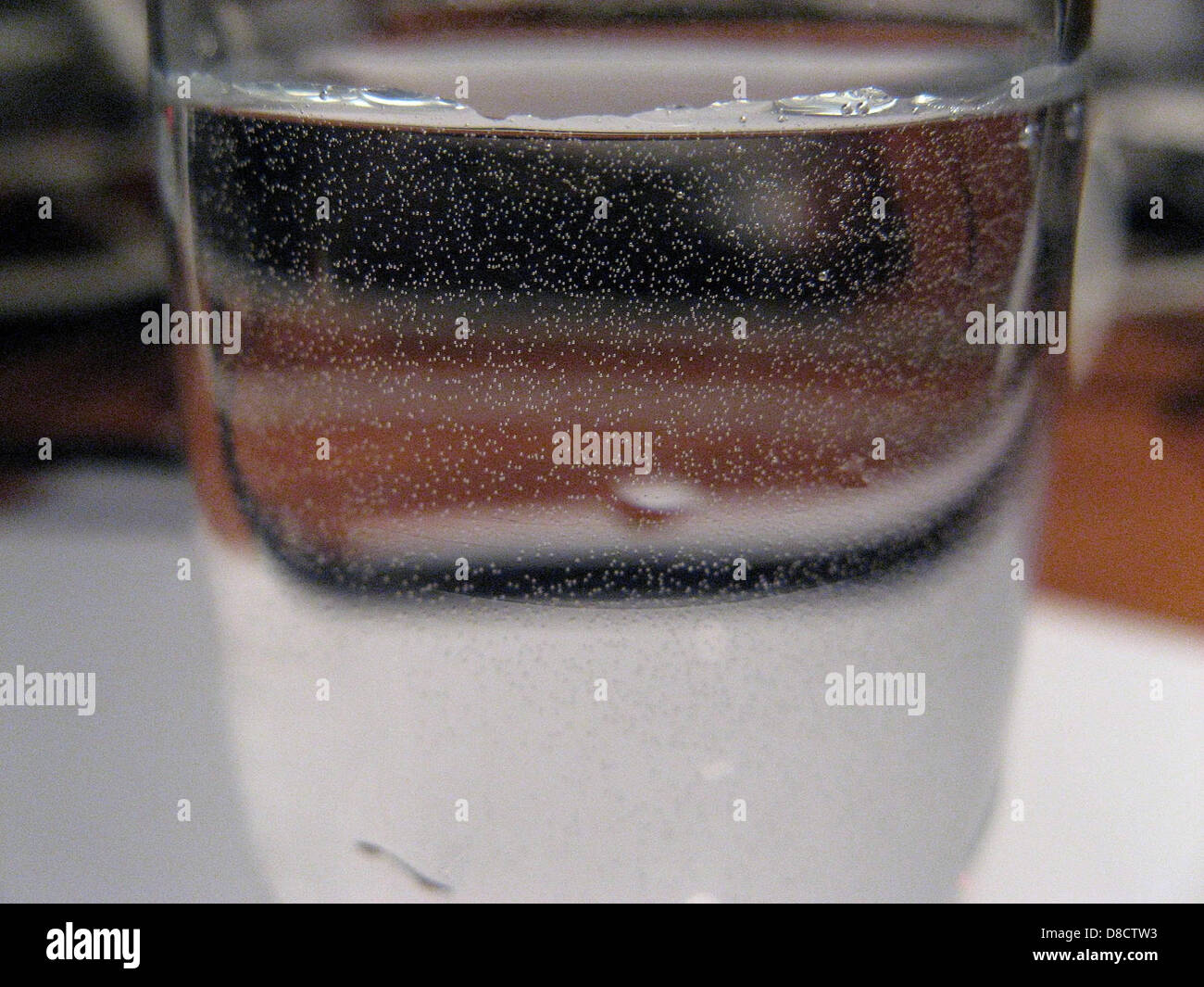 A close-up of small bubbles floating in the air. The image captures the ...