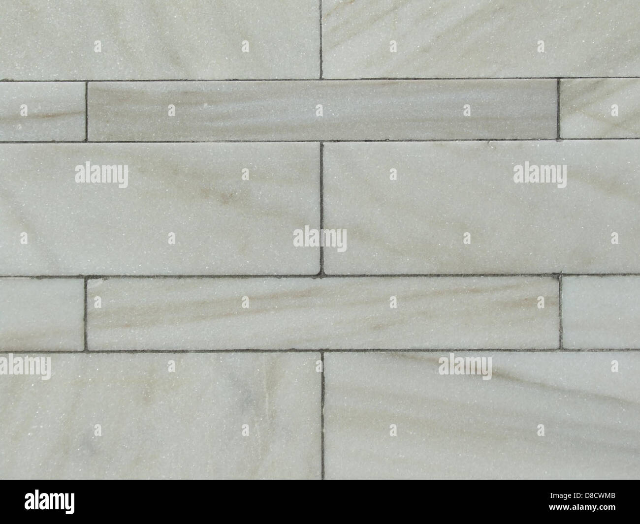 A close-up of marble blocks arranged in a repeating pattern, showcasing ...