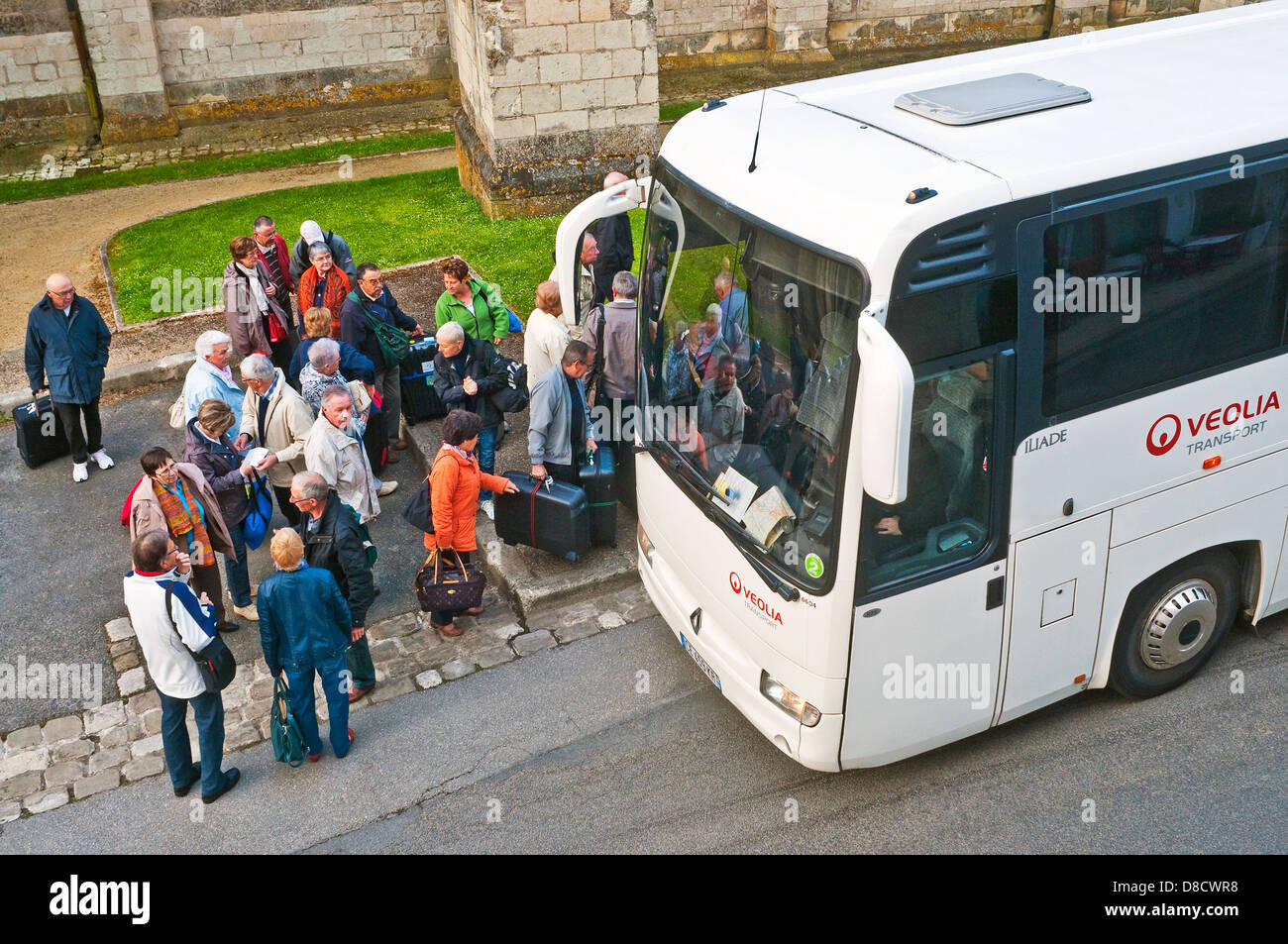 Group of tourists boarding bus / coach - France Stock Photo - Alamy
