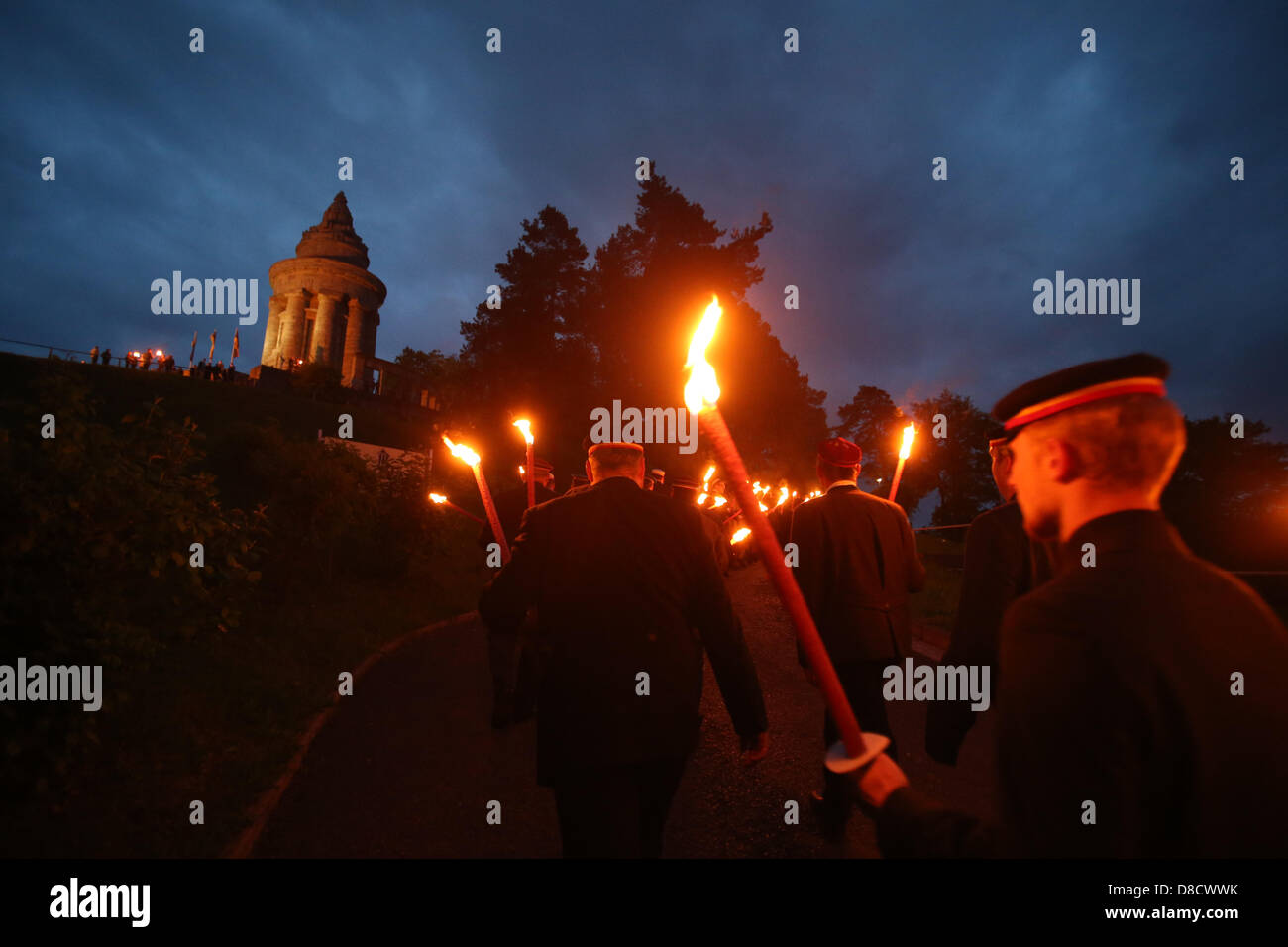 Members of different fraternities walk to a fraternity memorial ...