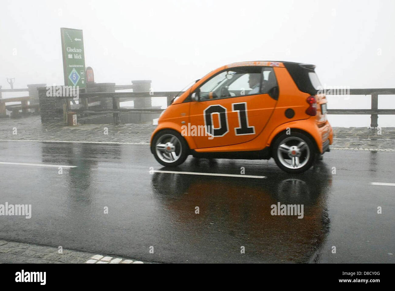 A mini car, compact in size and often associated with urban ...