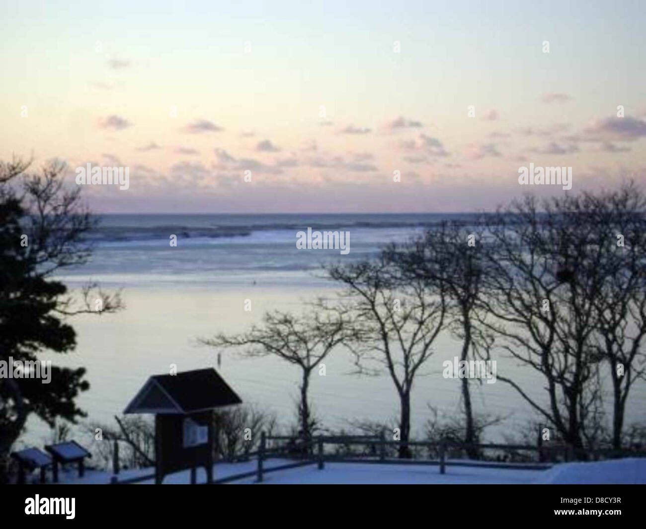 A winter scene of Morris Island, featuring snow-covered terrain and ...