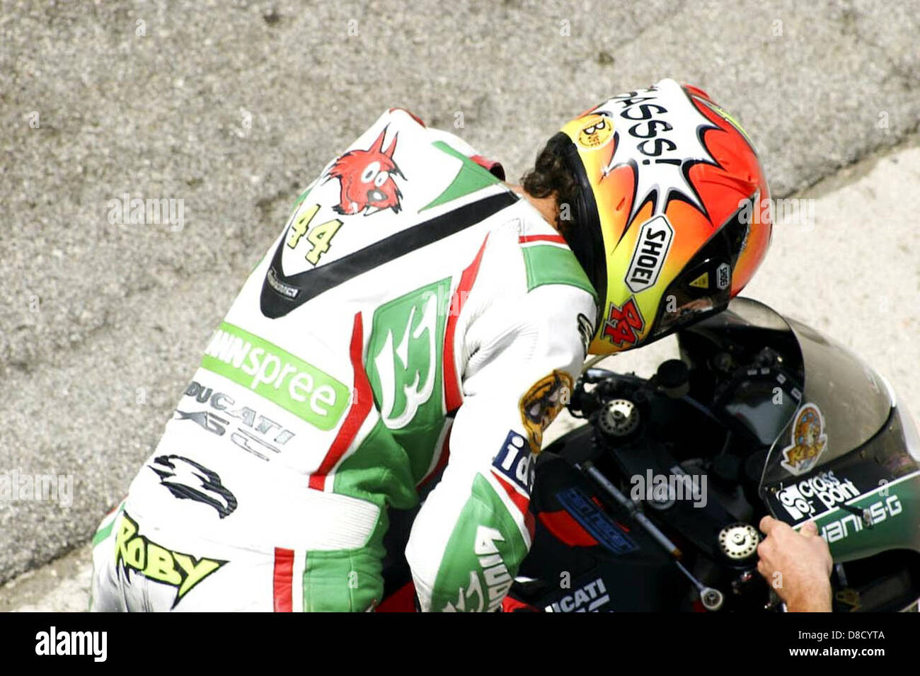 A motorcycle driver is seen riding a motorcycle, showcasing their skill ...