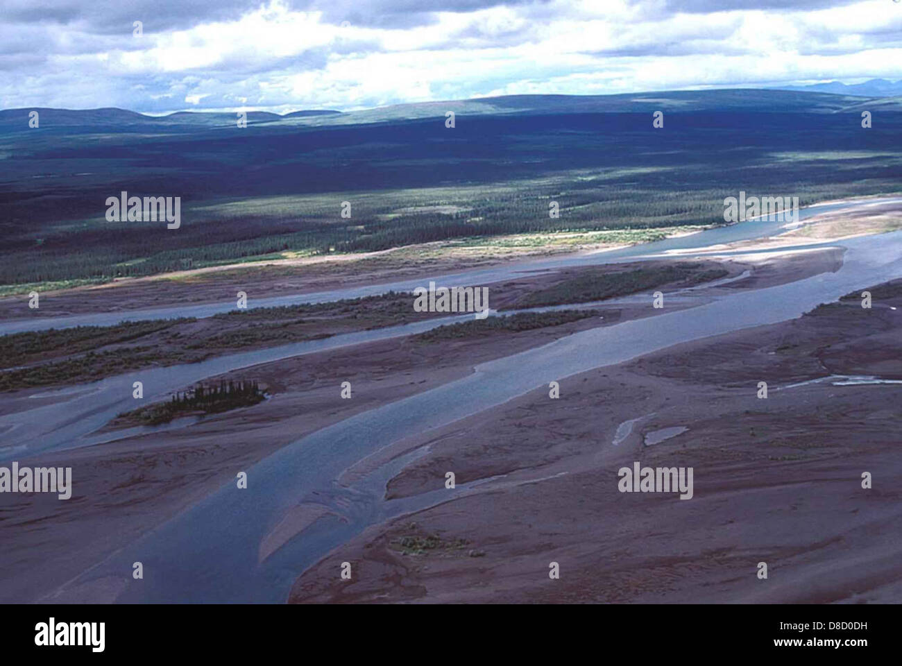 Mud flowing into a river during spring, as melting snow and rainfall ...