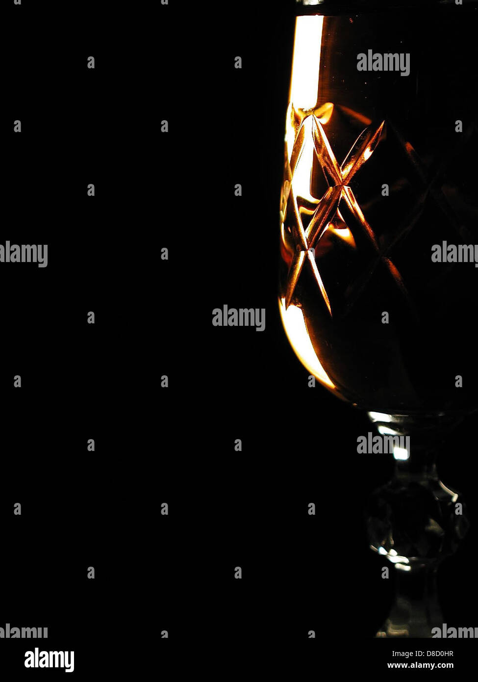 A glass object is captured in clear focus, showcasing its transparency ...