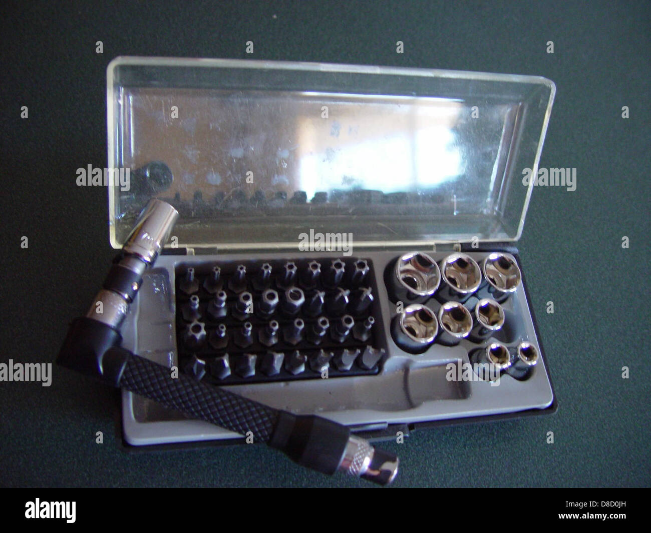 A multi-fitting spanner kit neatly arranged on a workbench, showcasing ...