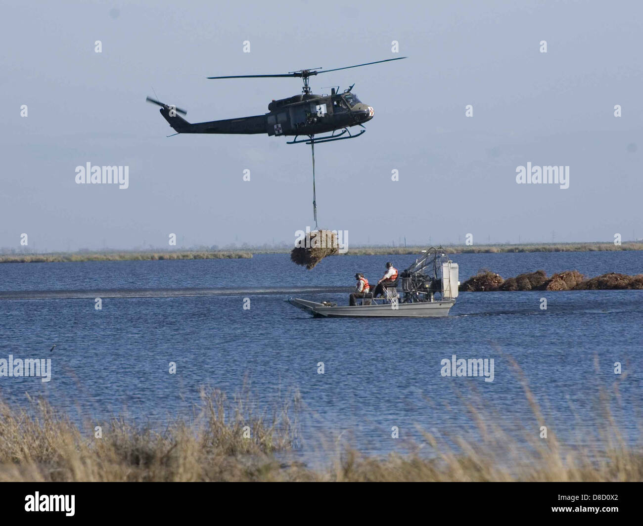 Helicopter and air powered boat in transport operation Stock Photo - Alamy