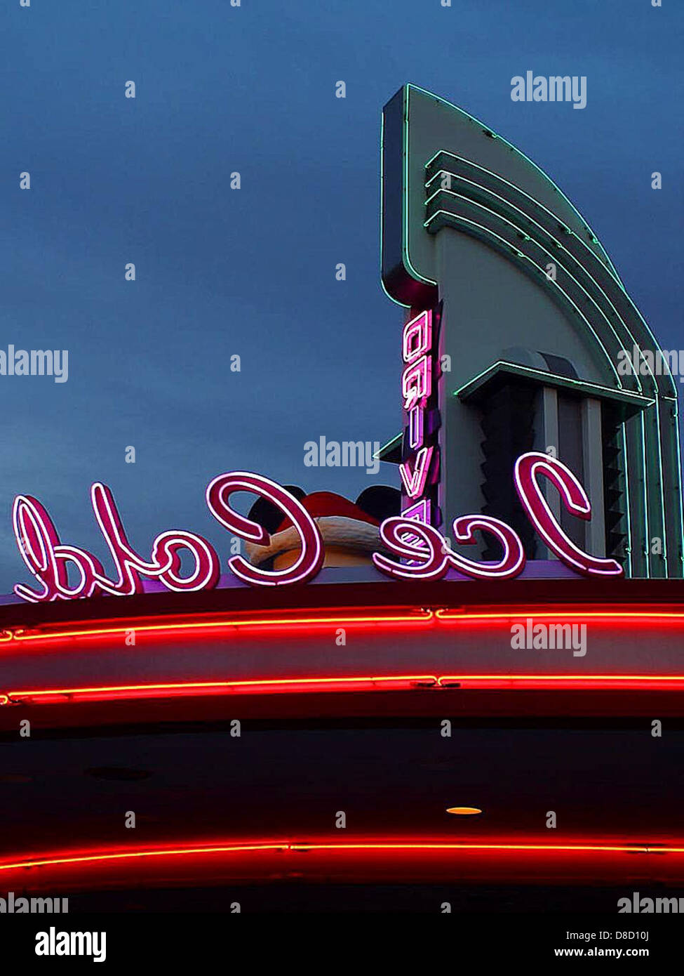 A neon sign displaying 'diners' with an 'ice cold' message, illuminated ...