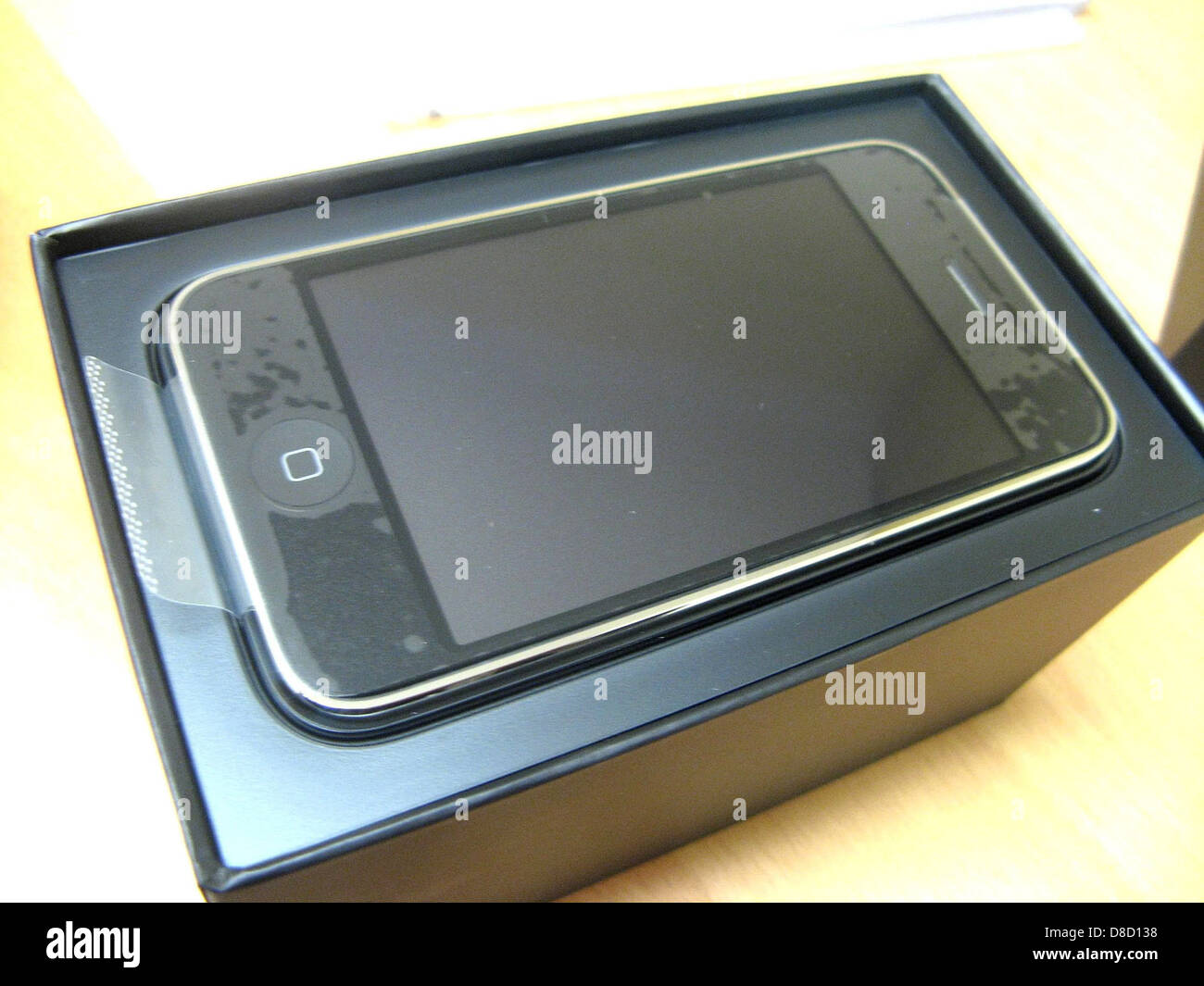 A close-up of the new iPhone model, showcasing its sleek design and ...