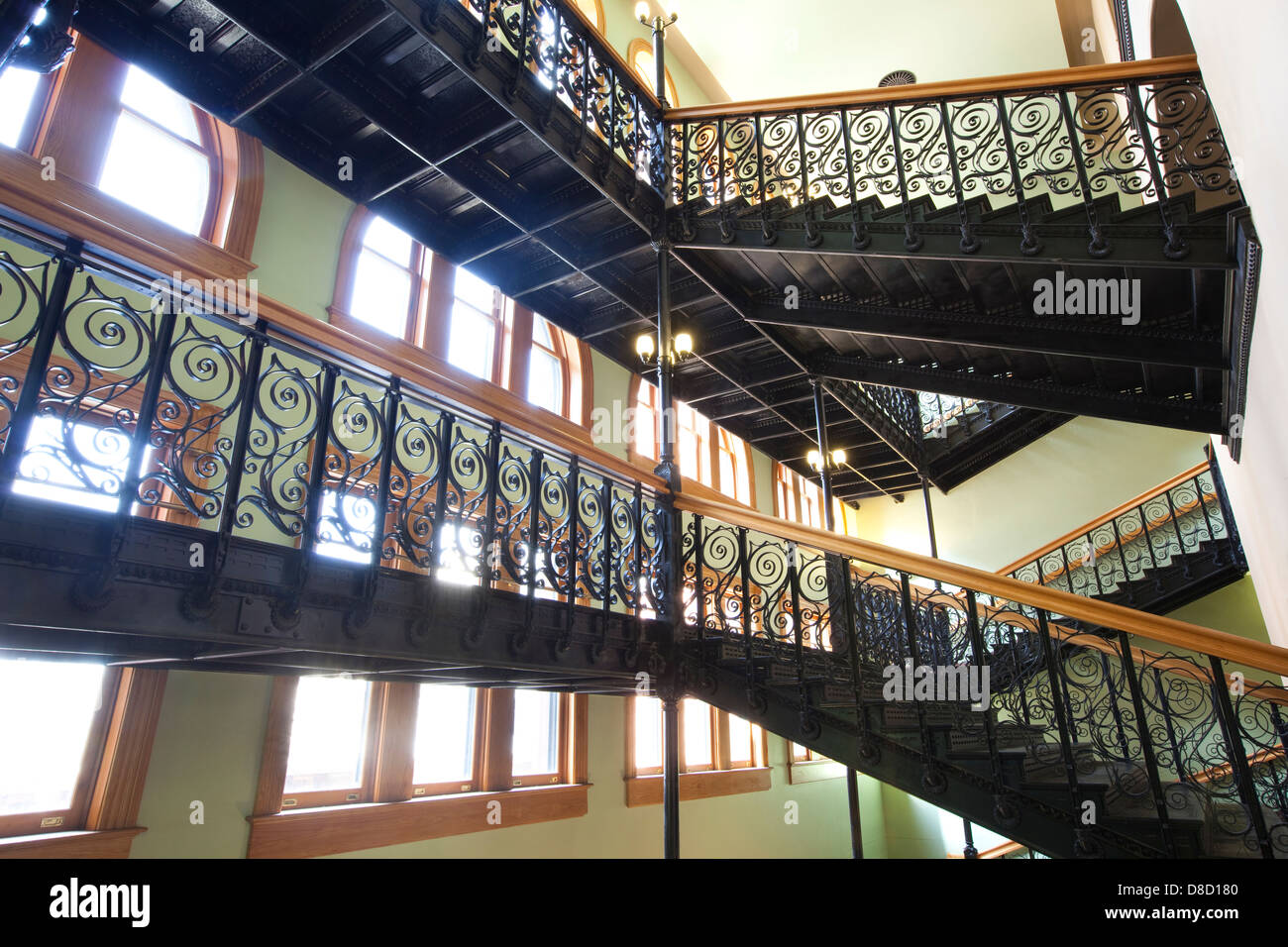 Interior view of the old red courthouse with Victorian style stair case ...