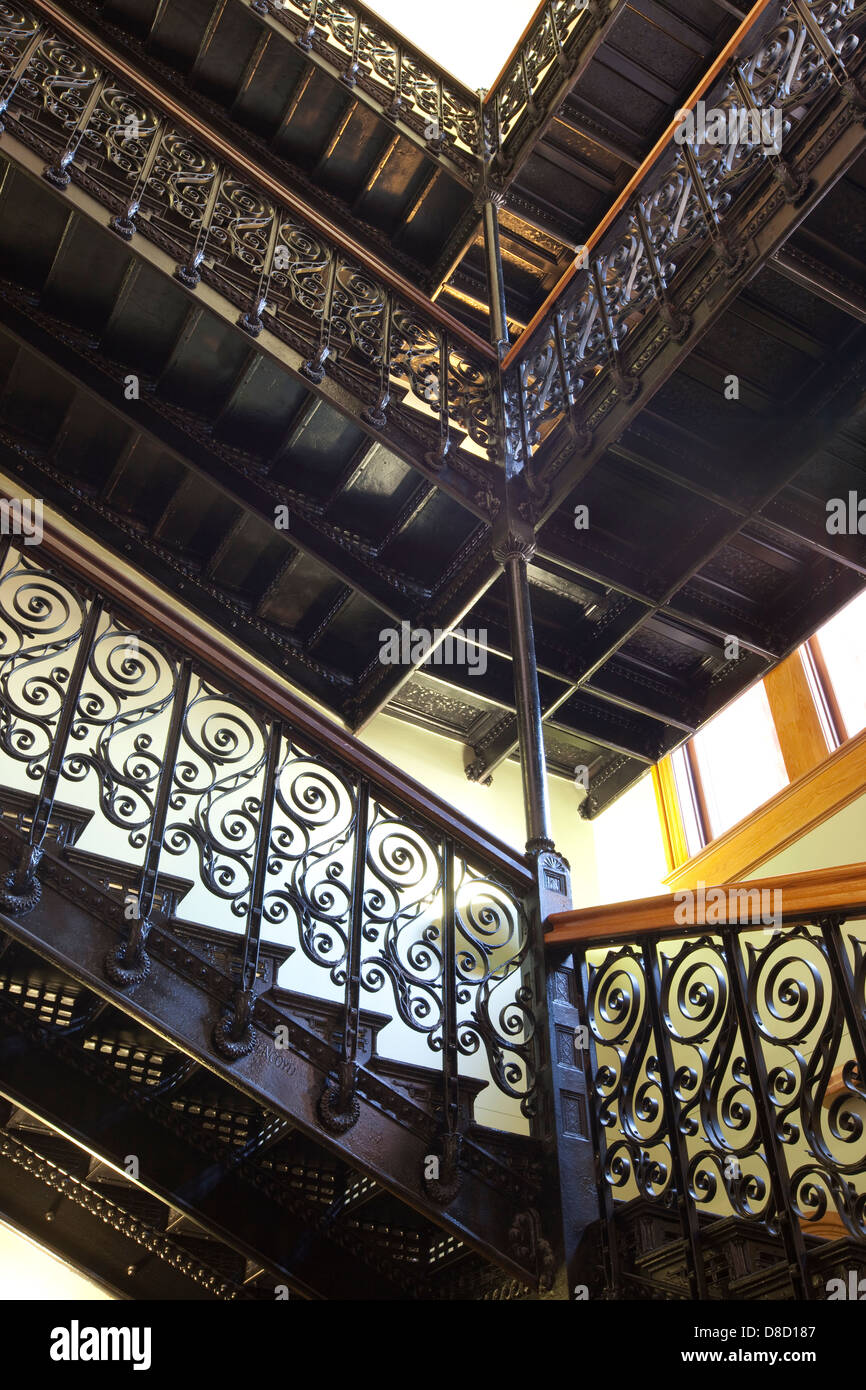 Interior view of the old red courthouse with Victorian style stair case ...
