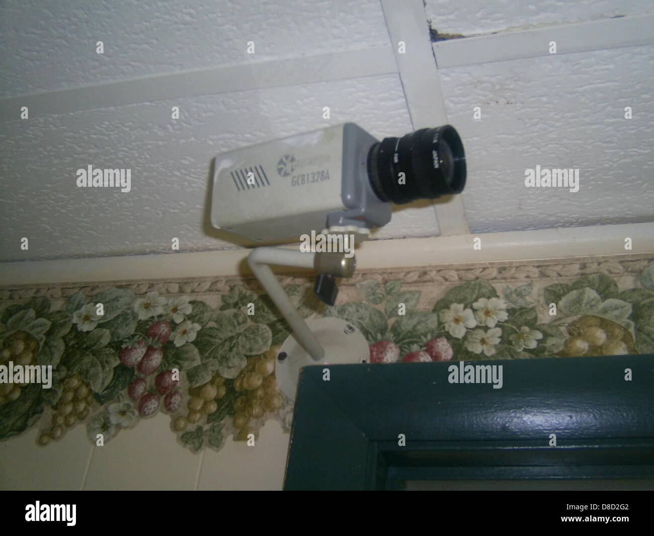 An old, non-working security camera is depicted in the image. Its ...