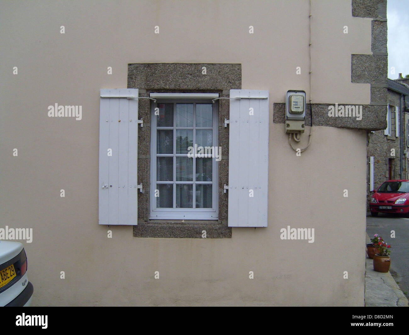 An old window with wooden shutters, showing the charm of traditional ...