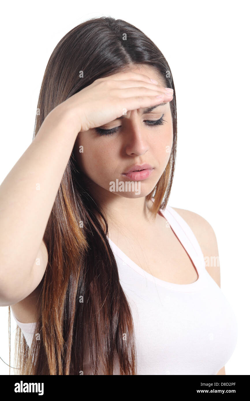 Woman with a headache and a hand in forehead isolated on a white ...