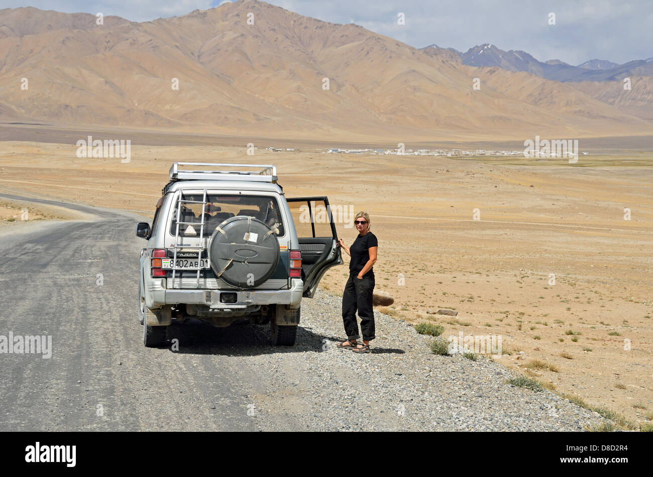 Driving on Pamir Highway Stock Photo - Alamy
