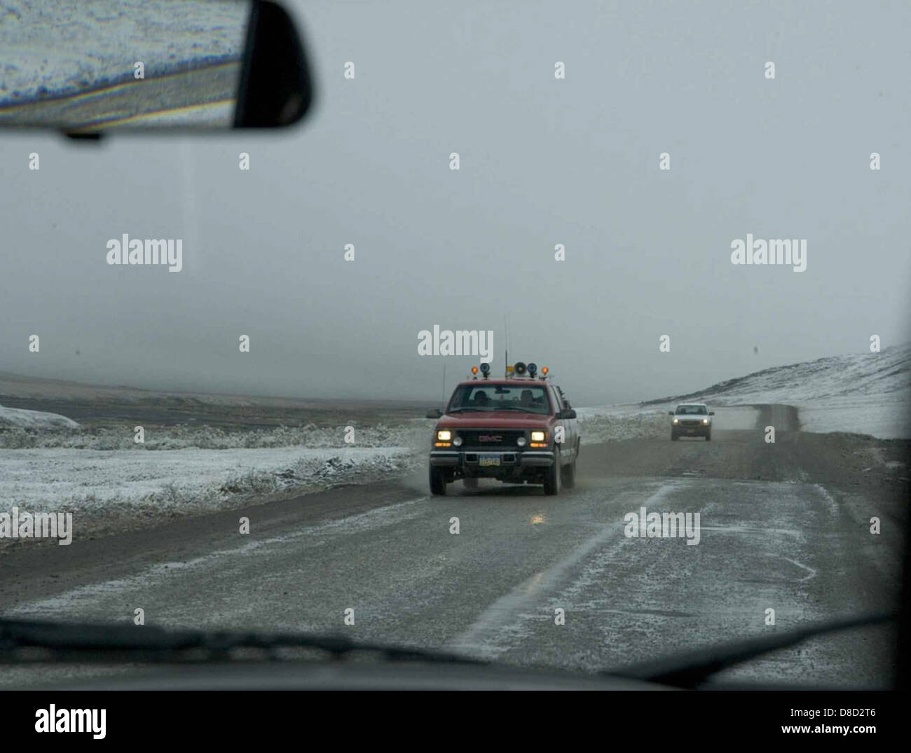 A view of oncoming traffic on a highway, showing multiple lanes filled ...
