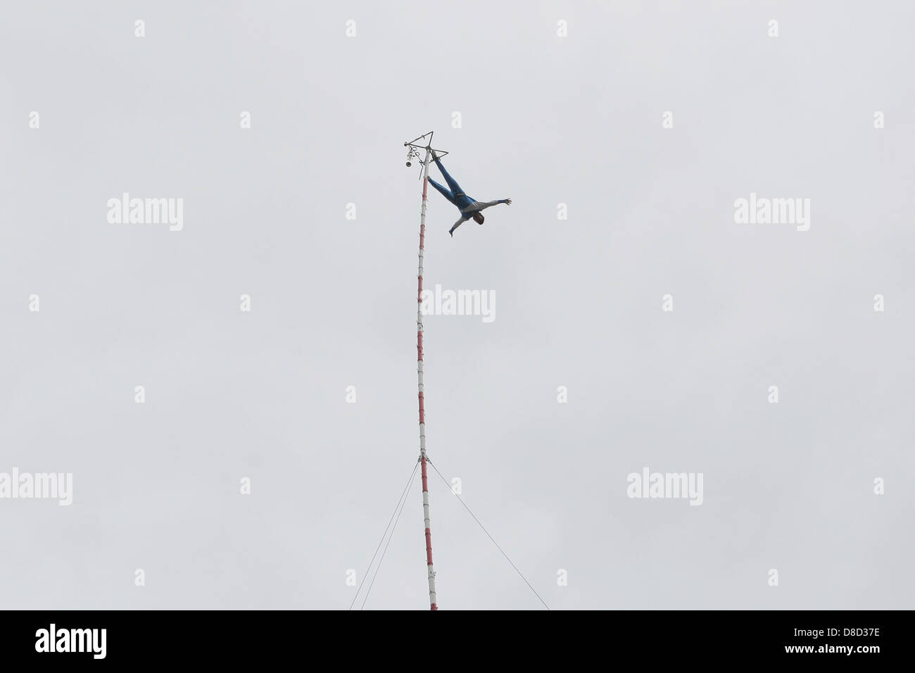 An artist performs an acrobatic show above the Zeil street during the ...