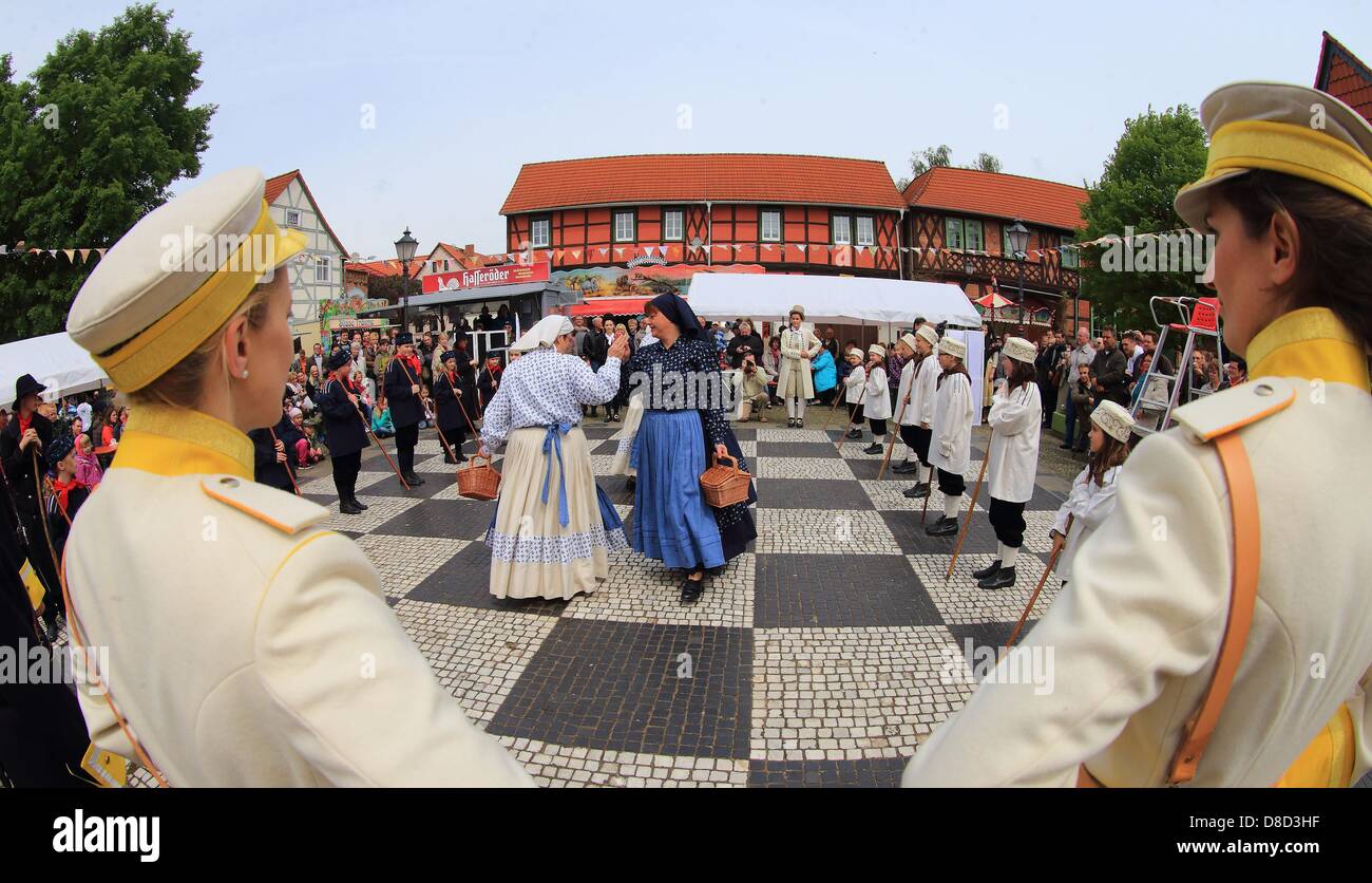The living chess ensemble stands on an oversized chess board in ...