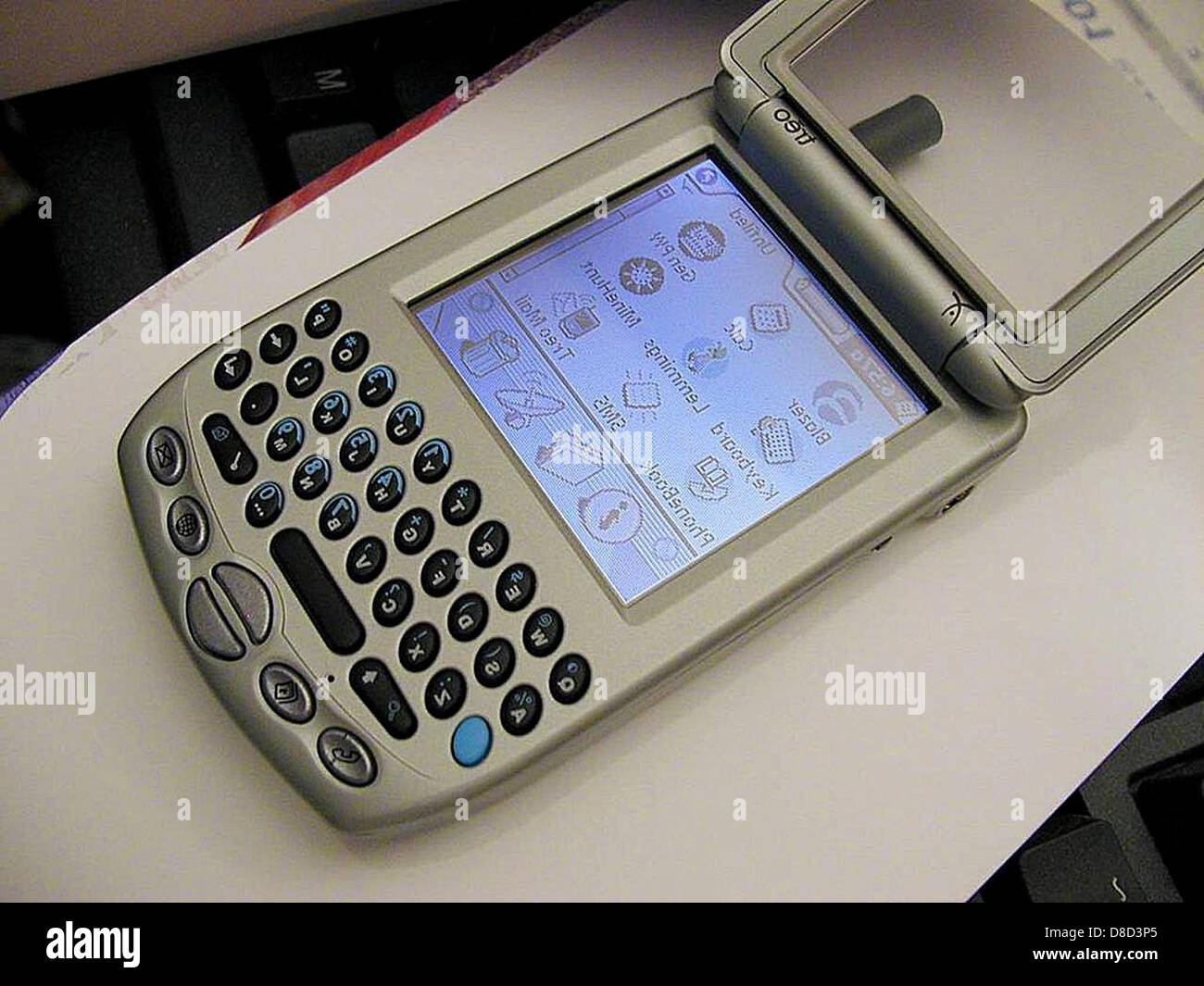 A set of handheld PDAs and cellphones held in palms, highlighting the ...