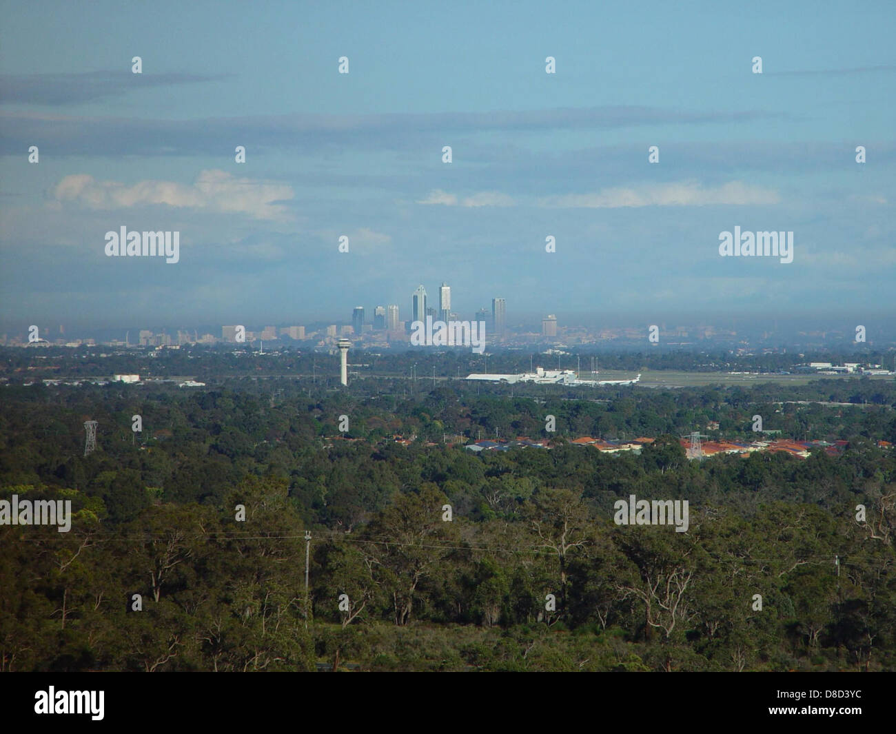 A distant view of Perth city, with its skyline visible against the ...