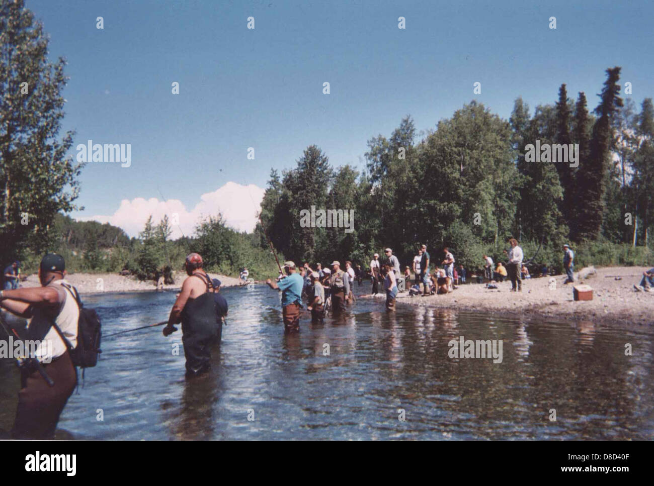 People at combat fishing on river Stock Photo - Alamy