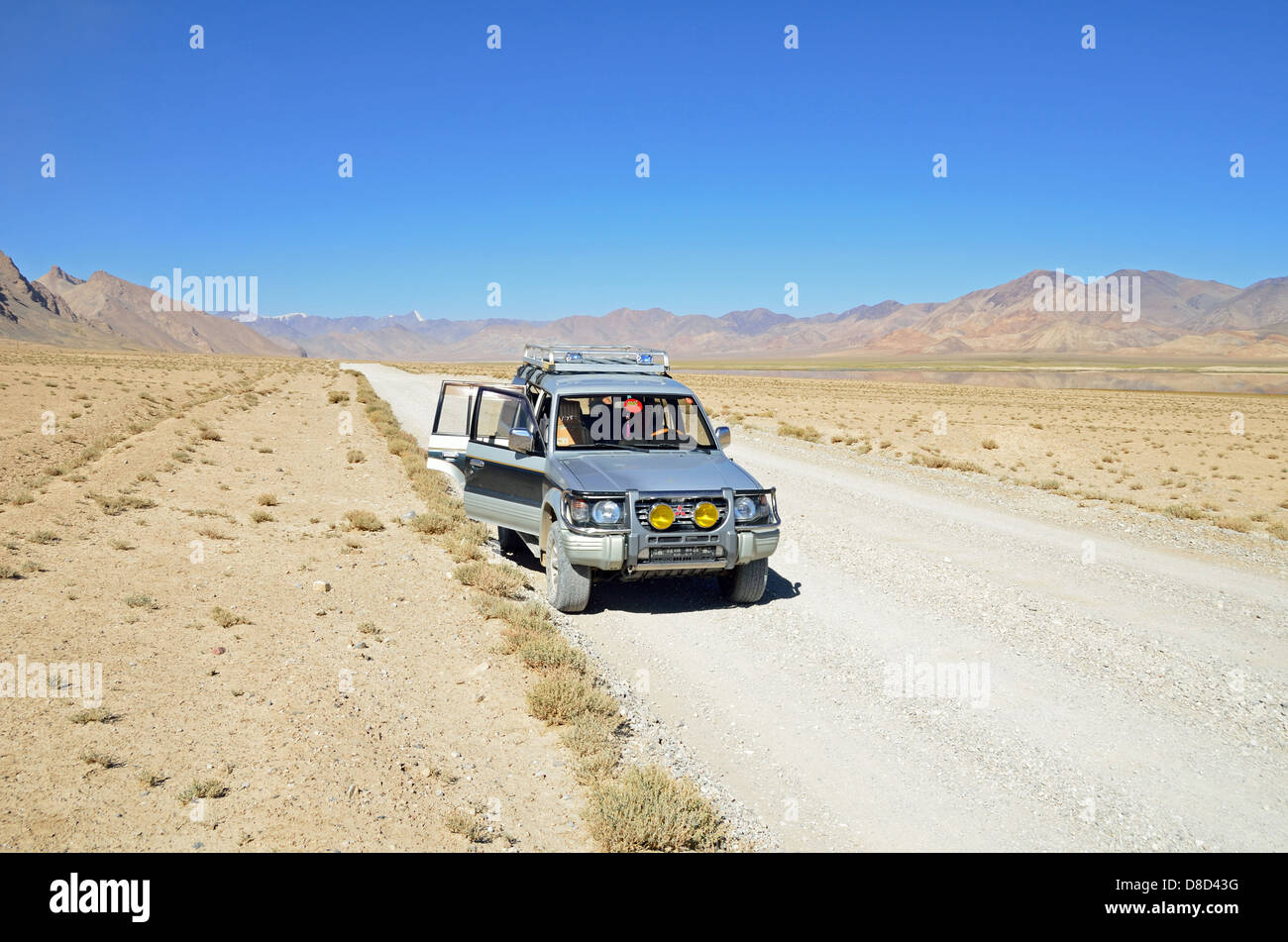 Driving on Pamir Highway Stock Photo - Alamy