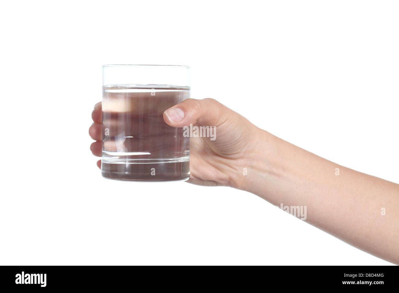 Woman hand holding a glass with water isolated on a white background ...
